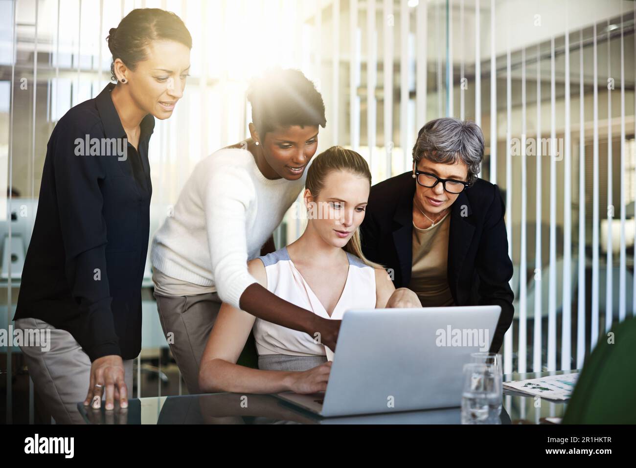 Teamwork, employees and women with a laptop, conversation and planning ...