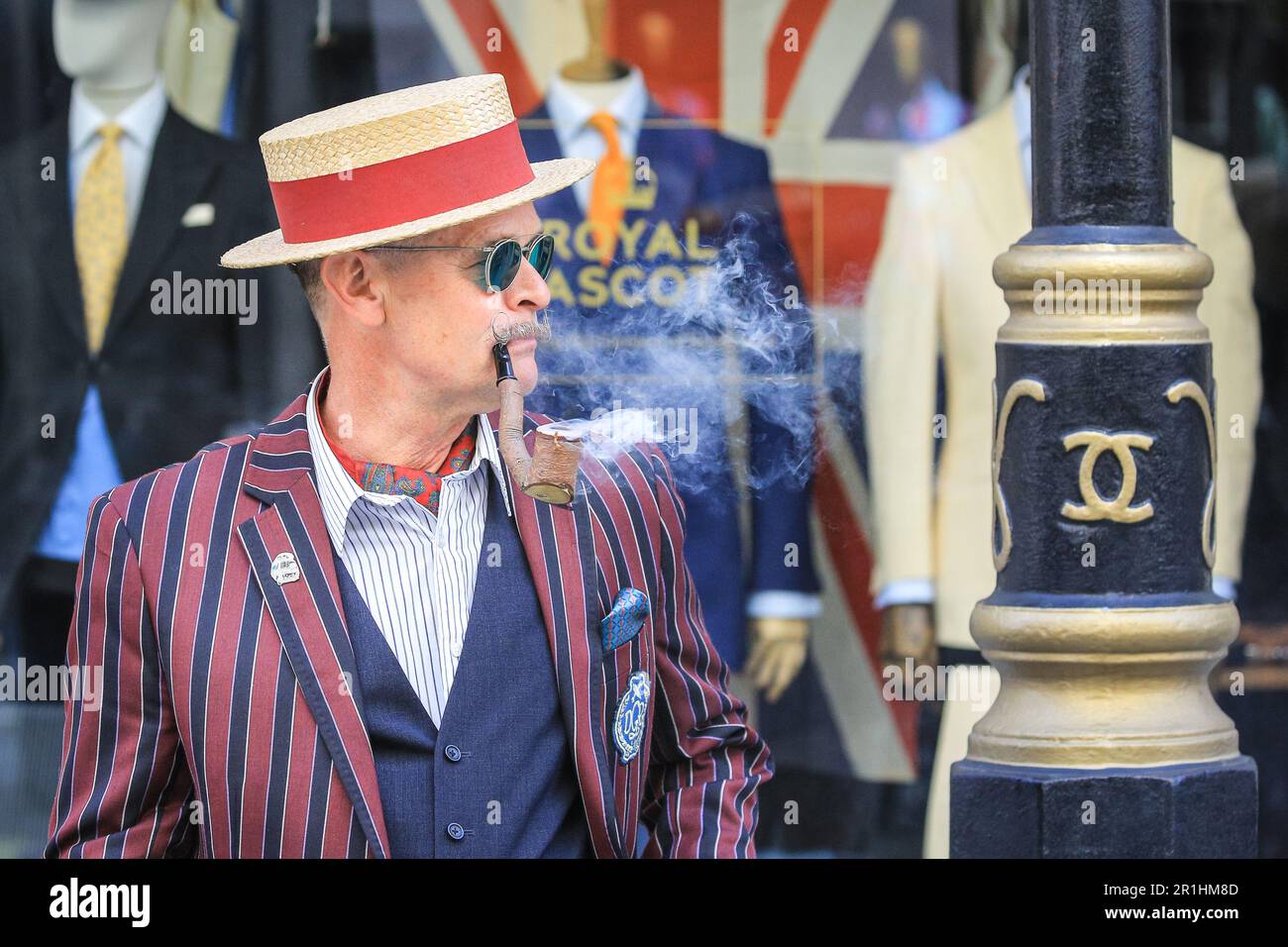 London, UK. 14th May, 2023. A chap enjoys his pipe. The annual Grand ...