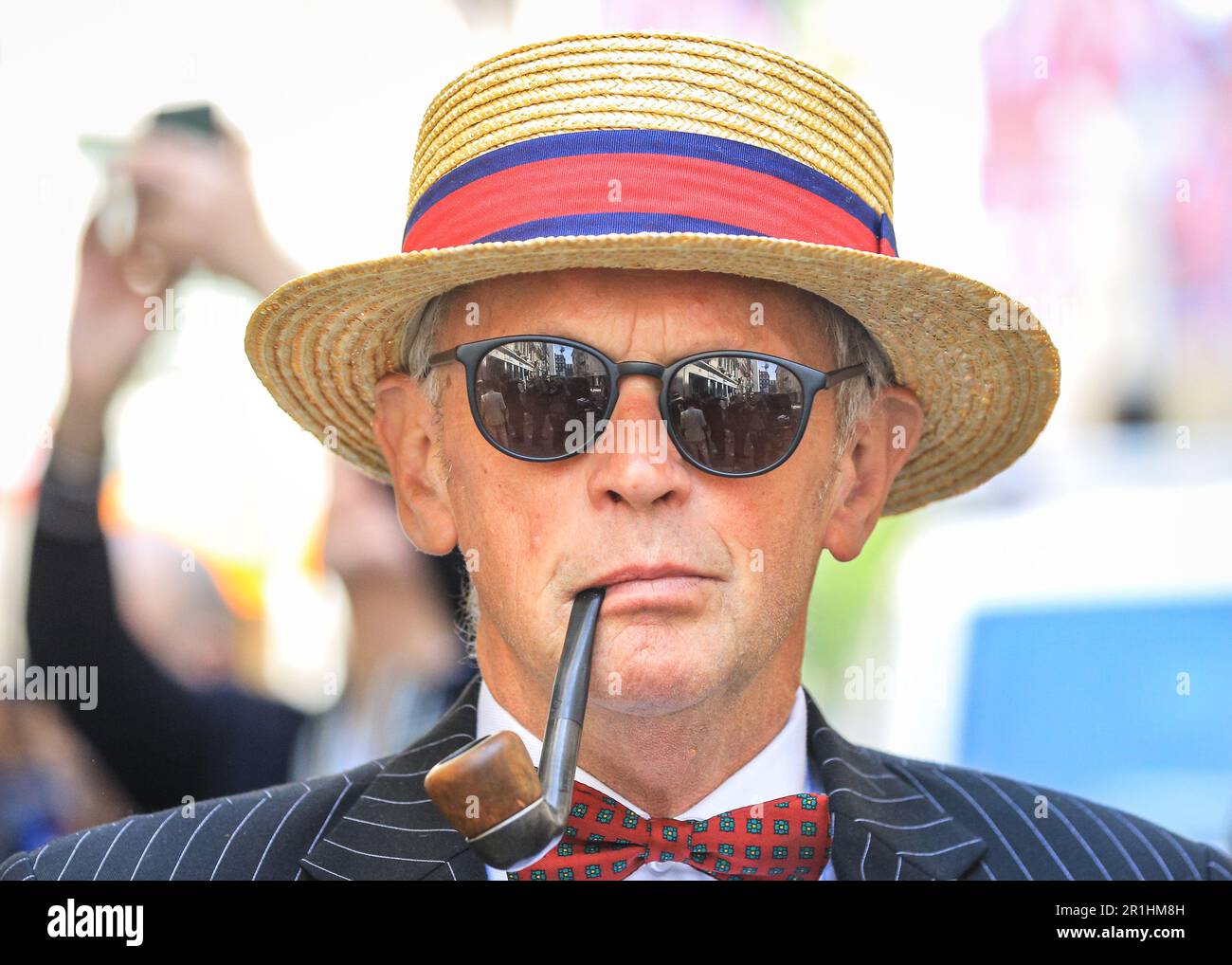 London, UK. 14th May, 2023. A chap enjoys his pipe. The annual Grand ...