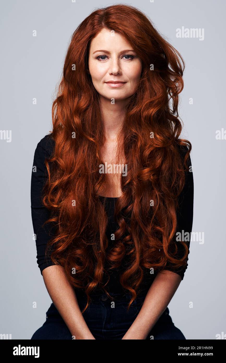 Ginger hair, beauty and portrait of woman in studio for hairdresser ...
