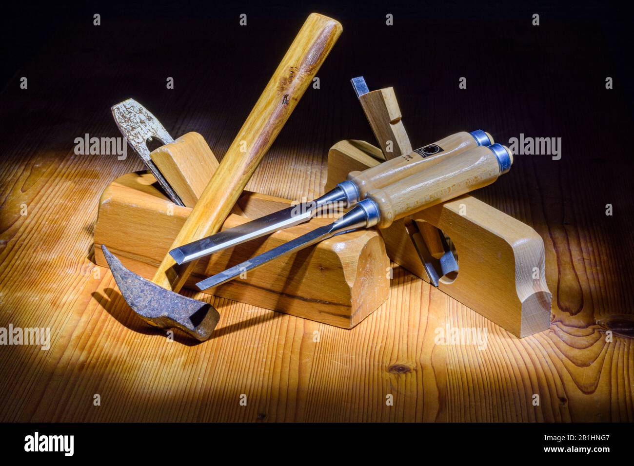 hammer planes chisels for carpenter's manual work, on wooden table and ...