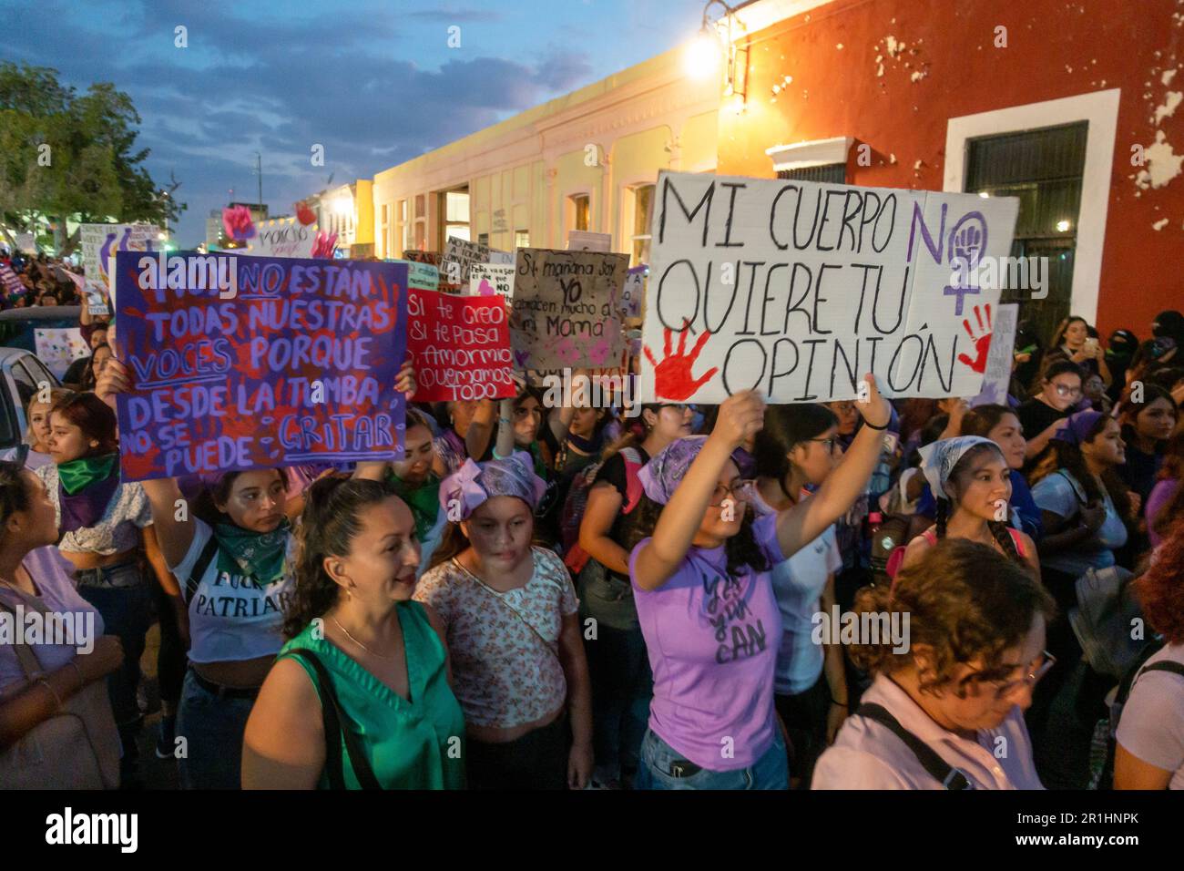women marching in downtown centro Merida Yucatan Mexico for ...