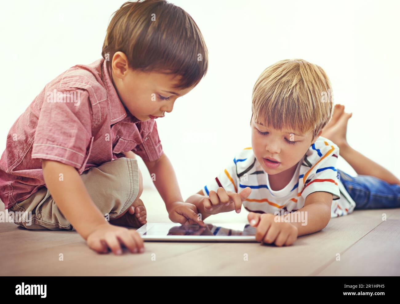 Tablet, learning and children playing together in family home for fun ...