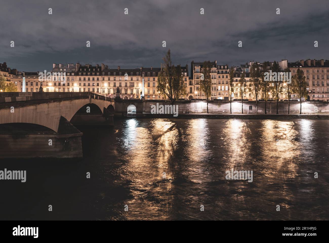Paris, France. Reflections of waterfront buildings on the River Seine ...