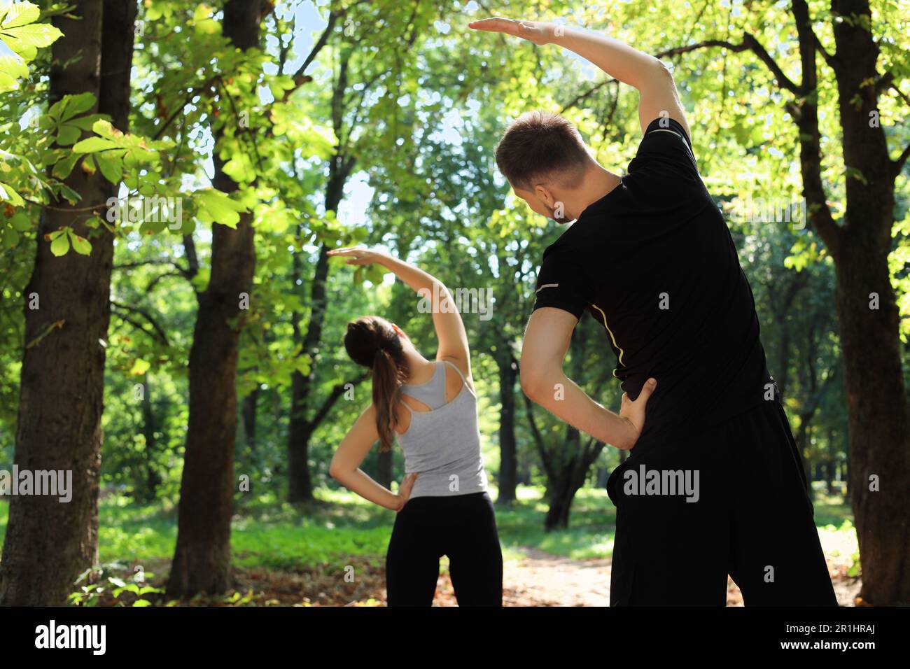 Back view of man doing stretching hi-res stock photography and images ...