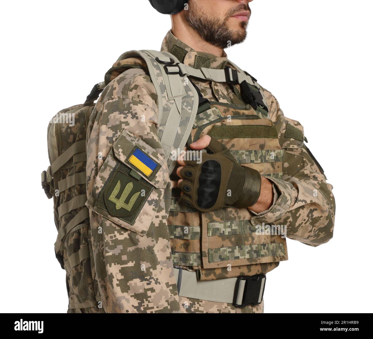 Soldier in Ukrainian military uniform with backpack on white background ...