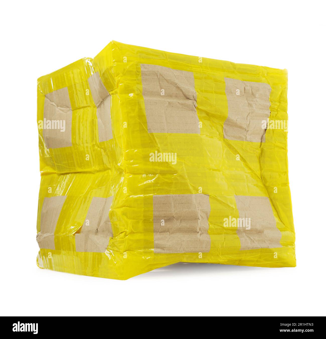 Crumpled cardboard parcel box with yellow sticky tape on white ...