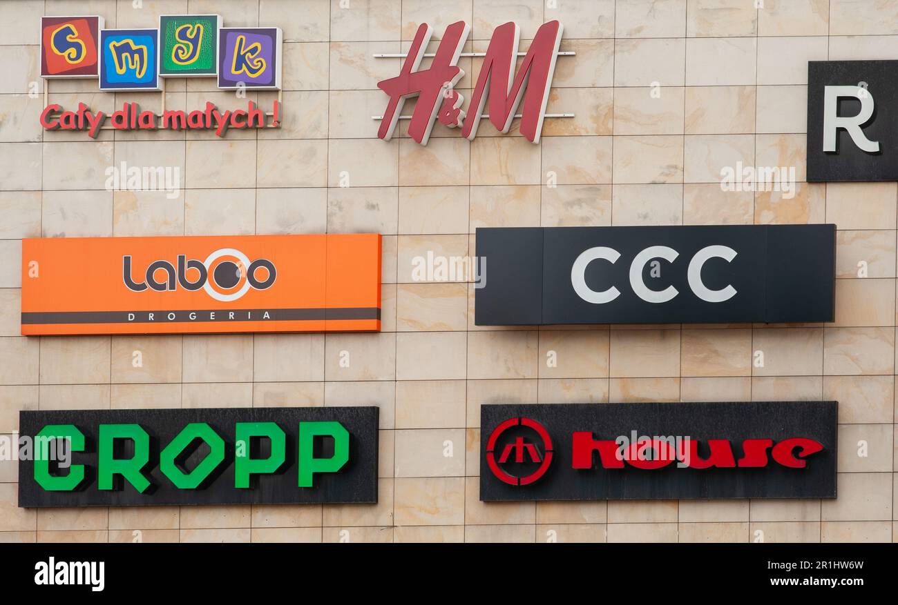 SIEDLCE, POLAND - AUGUST 30, 2022: Shopping mall with different store brand logos outdoors Stock ...