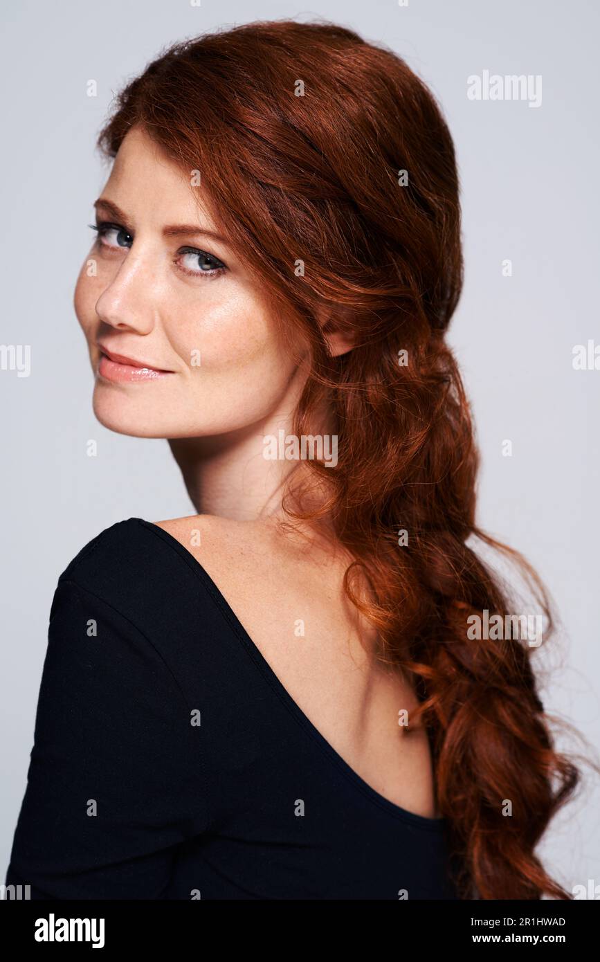 Ginger, hairstyle and portrait of woman in studio for salon, hair care ...