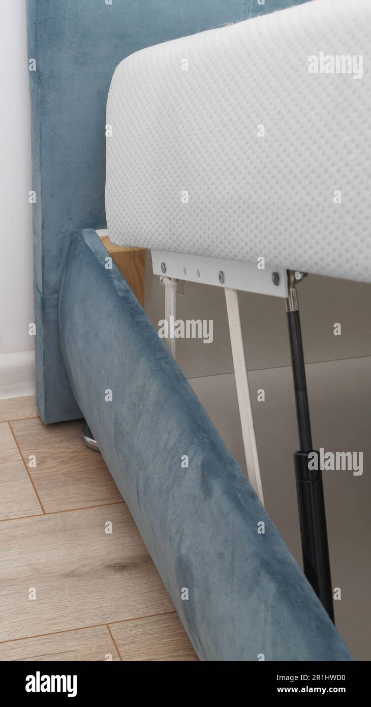 Closeup view of lifting mechanism for opening under bed storage Stock ...