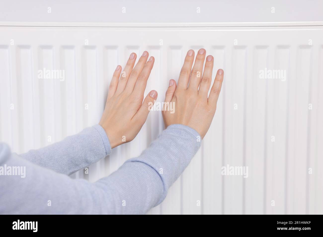 Female hands on radiator hi-res stock photography and images - Alamy
