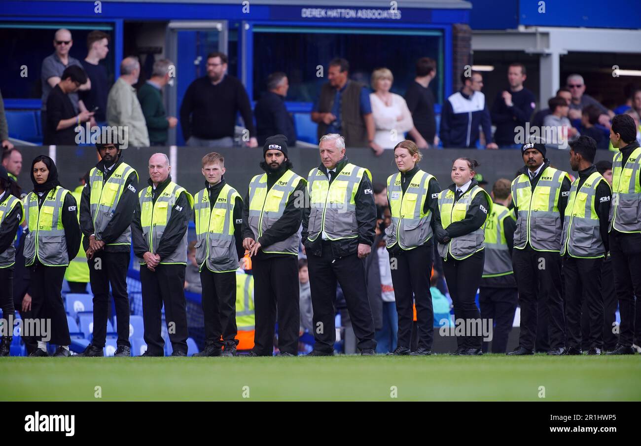 Stewards on the pitch after the final whistle of the Premier League ...