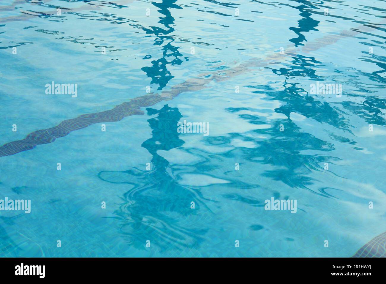 Outdoor swimming pool with clear rippled water Stock Photo - Alamy