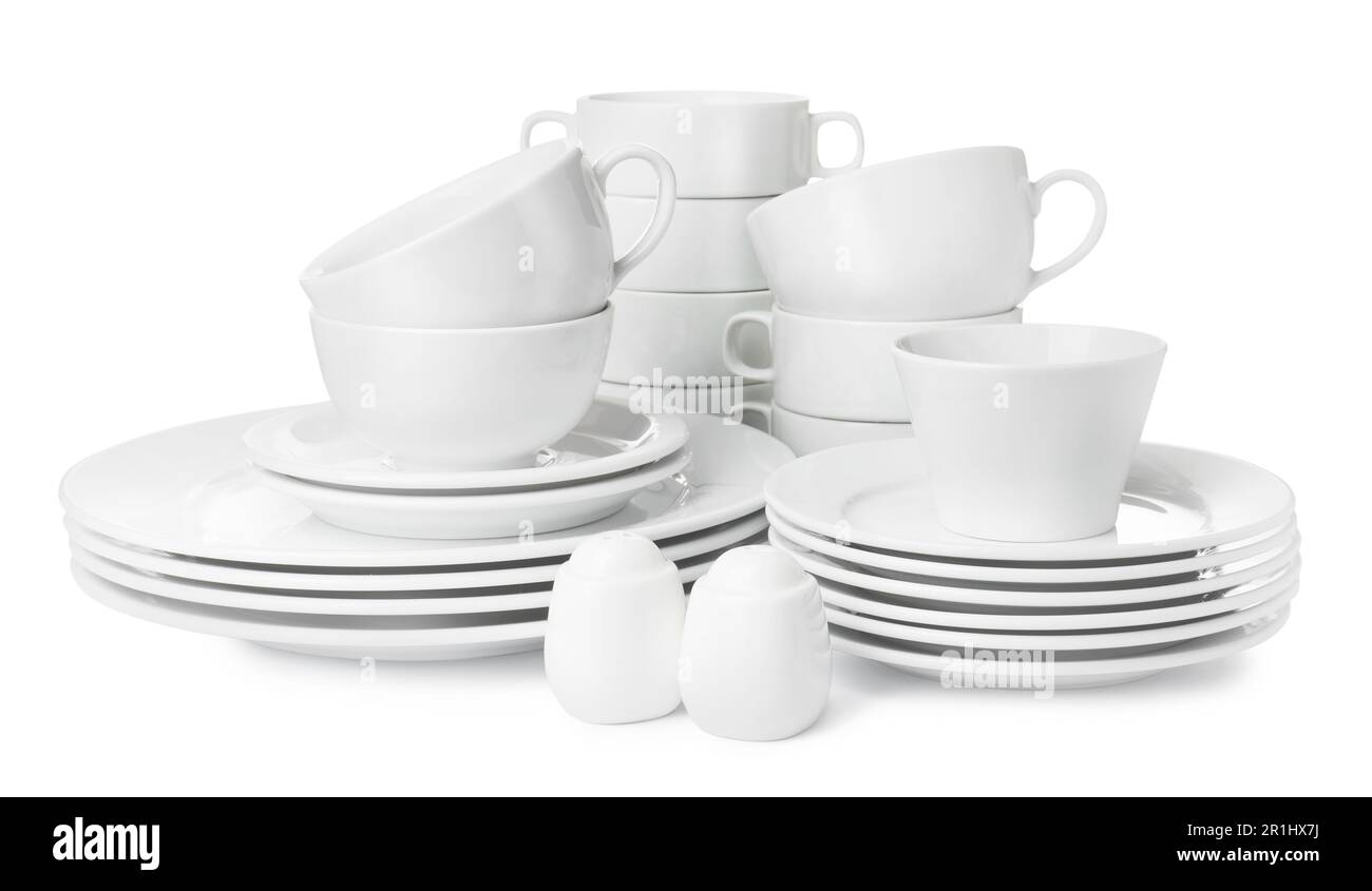 Set of clean dishware isolated on white Stock Photo - Alamy