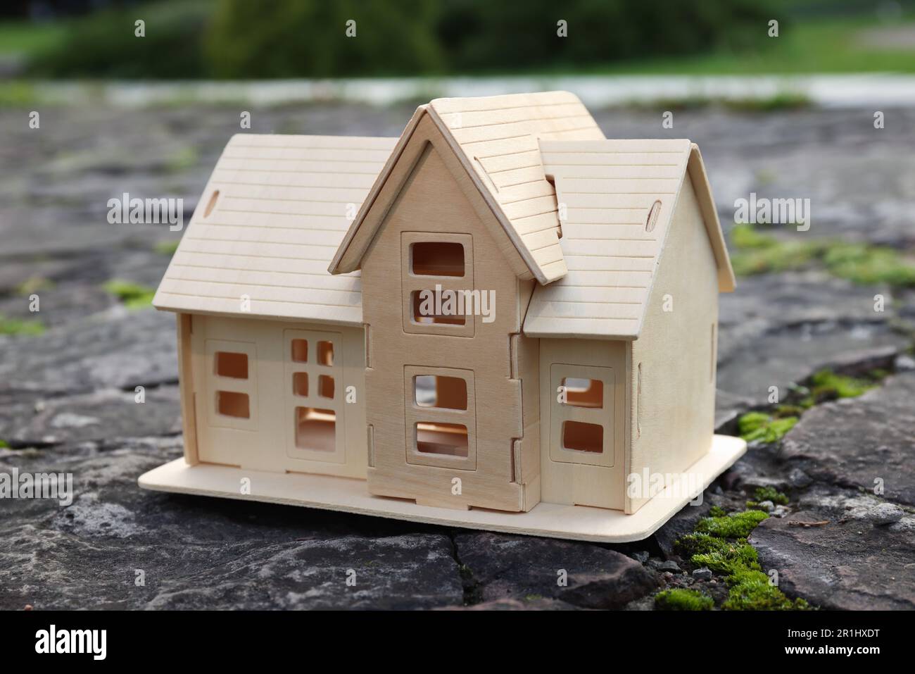 House model on stone road with cracks. Earthquake disaster Stock Photo ...
