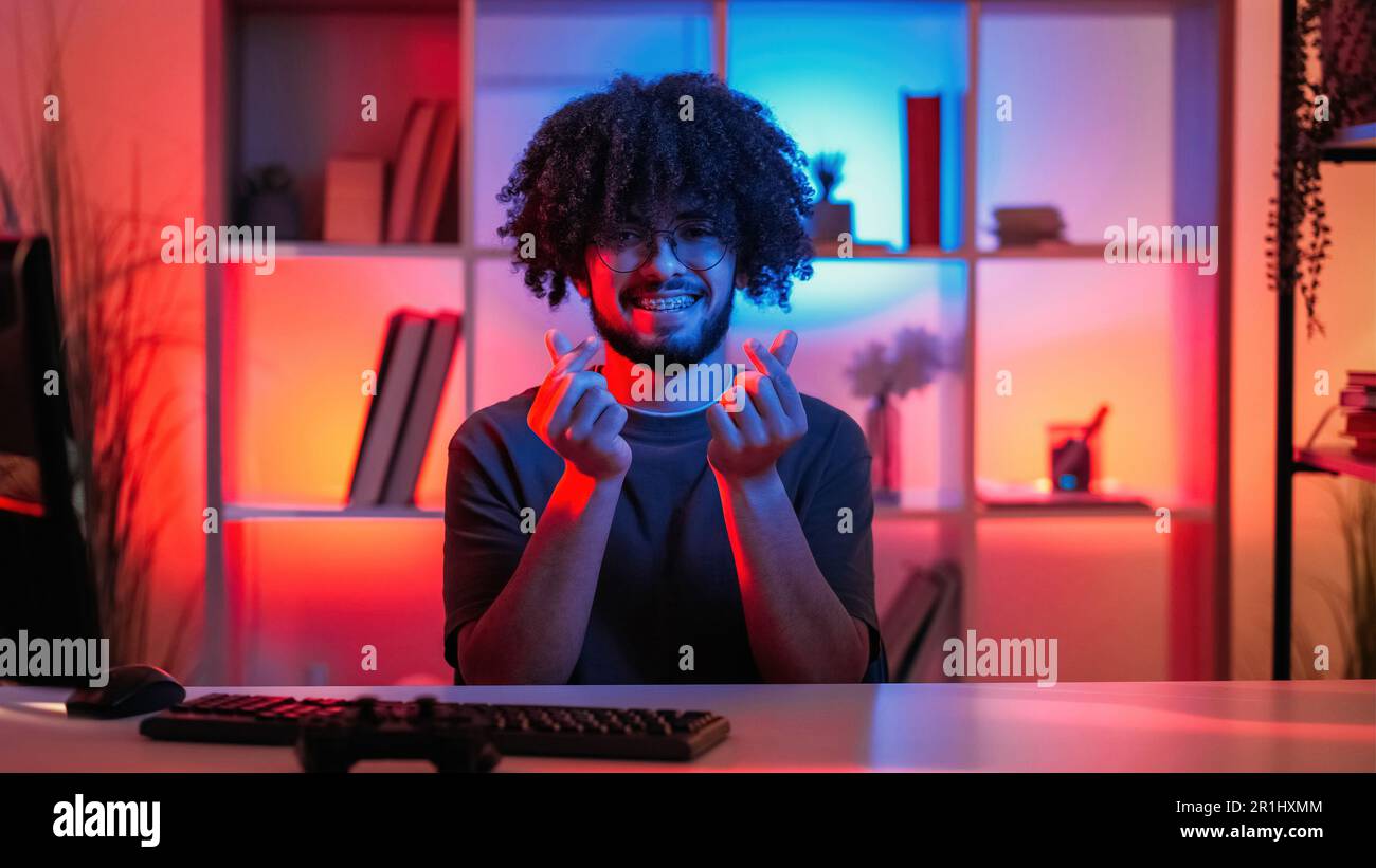 Small heart gesture positive man hand expression Stock Photo - Alamy