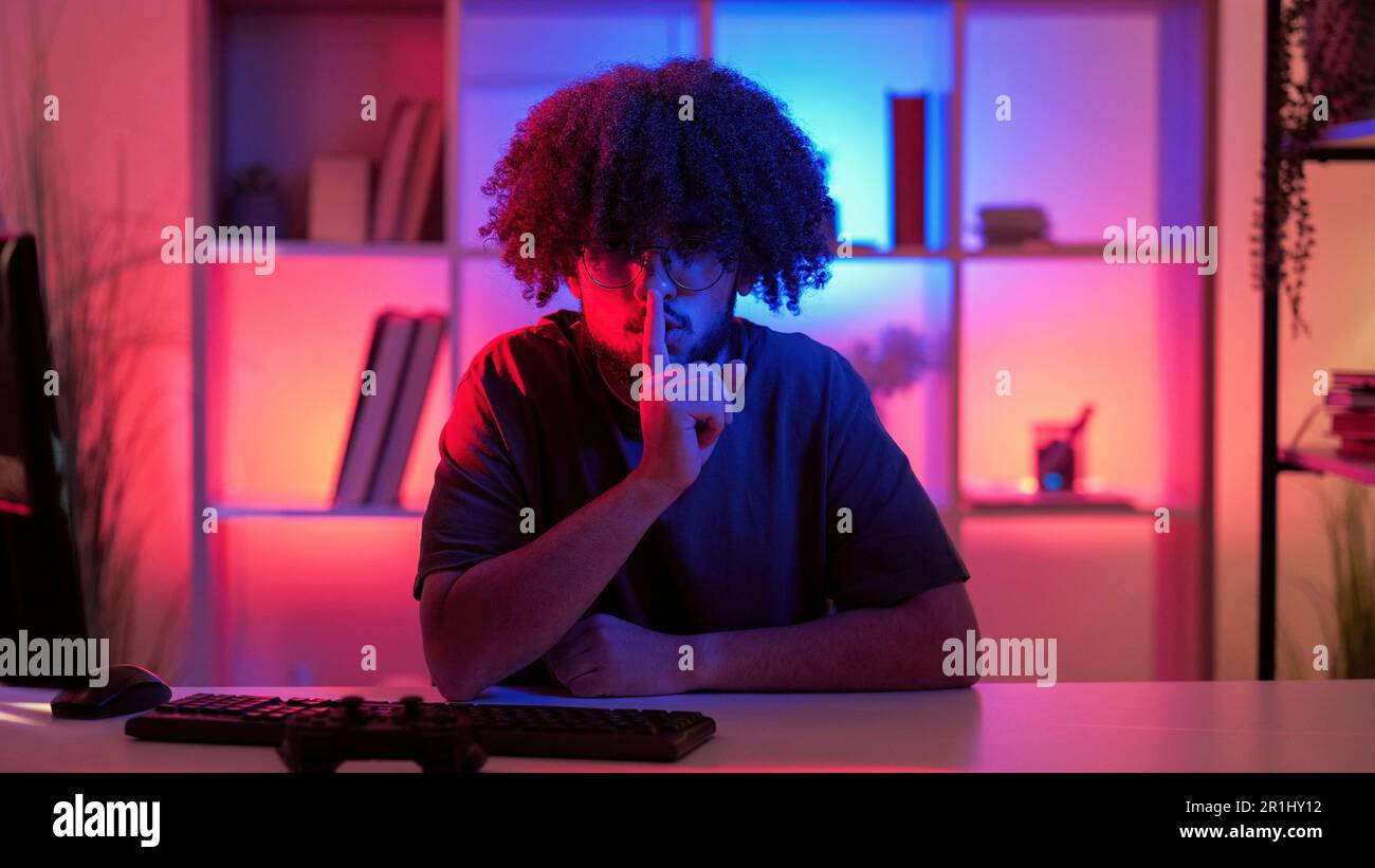 Keep quiet silent man hand gesture hipster guy Stock Photo - Alamy