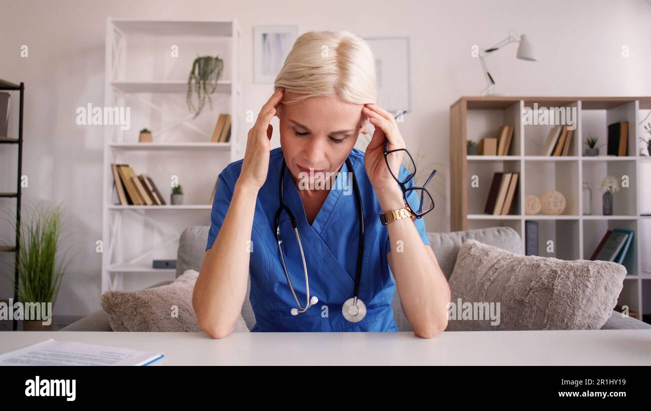 Woman doctor after hard work hi-res stock photography and images - Alamy