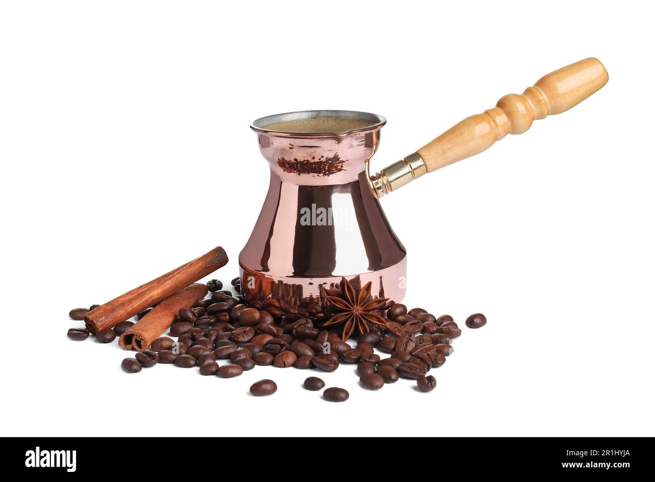 Turkish coffee. Cezve with hot coffee and spices on white background ...