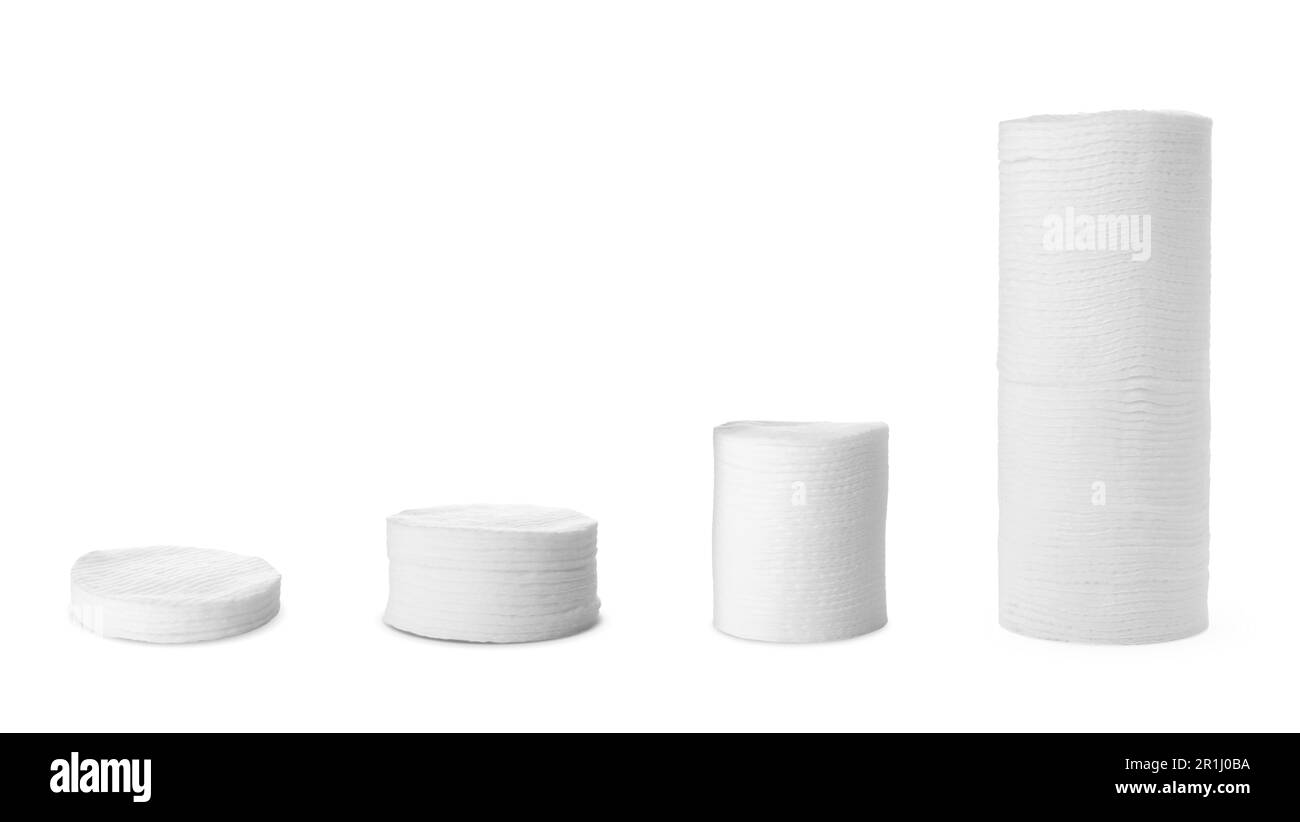 Set with stacks of soft clean cotton pads on white background. Banner ...