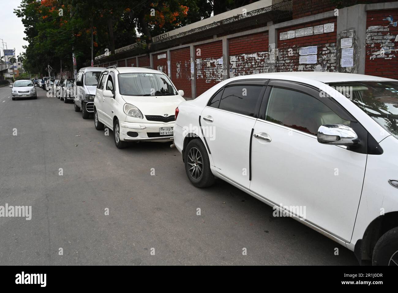 Dhaka, Bangladesh. 14th May, 2023. Vehicle drivers queue waits to ...