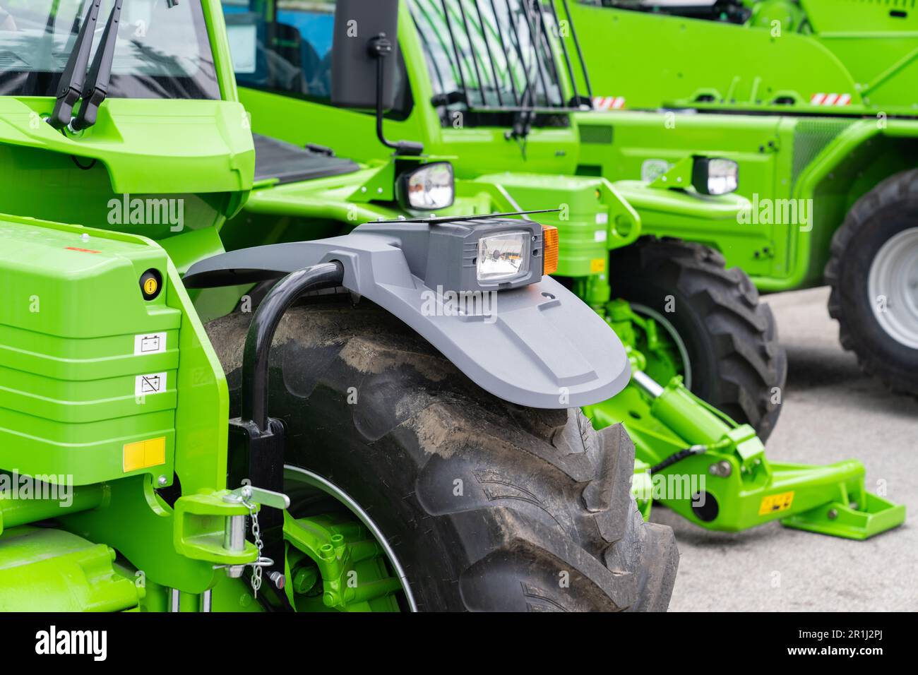 Fleet of green road machines. High quality photo Stock Photo - Alamy