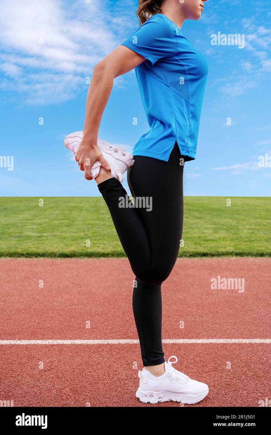 Female athlete warming up before run, runner on running track Stock ...