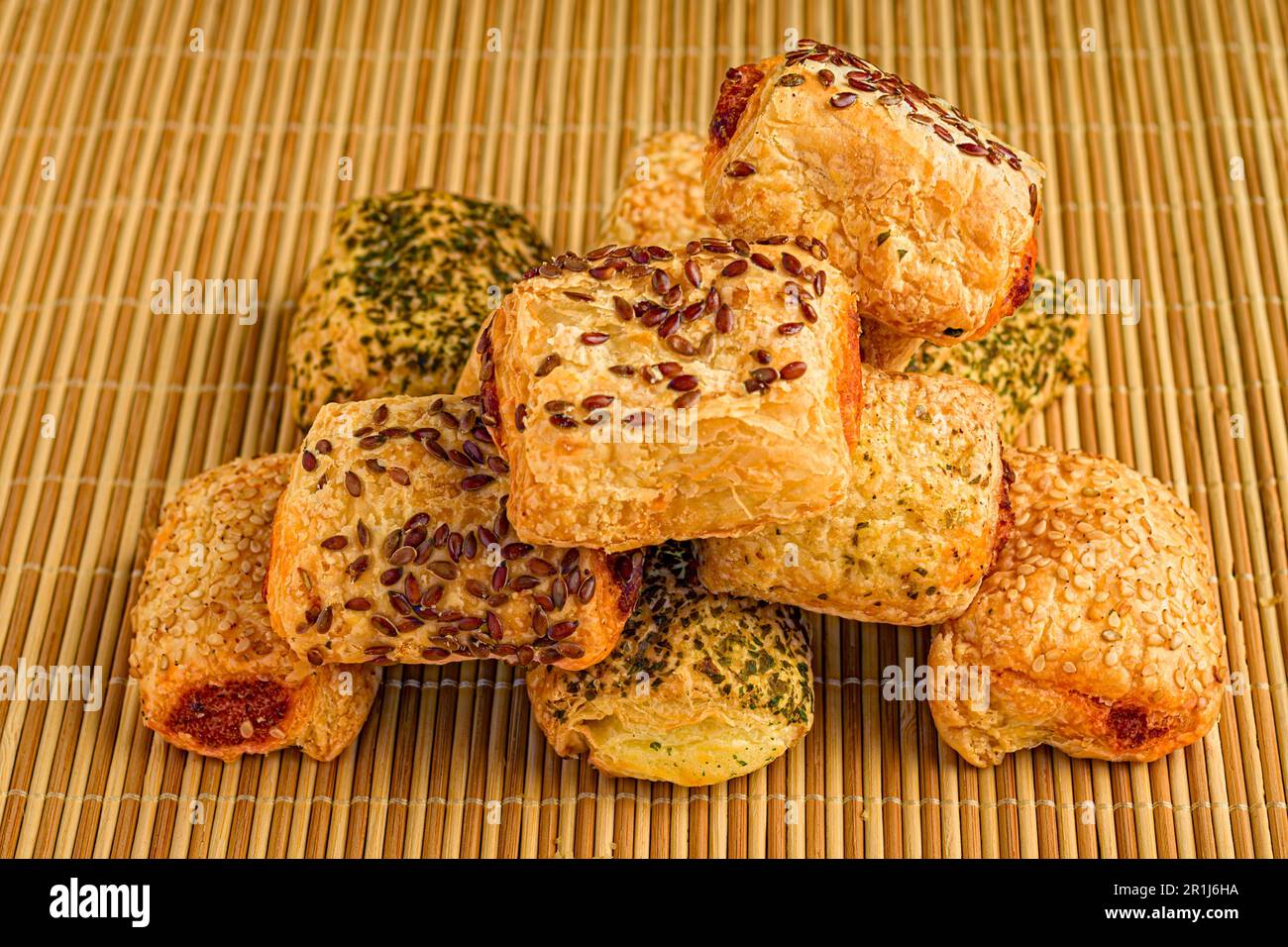 An assortment of salty puff sweet bites with chorizo Stock Photo - Alamy