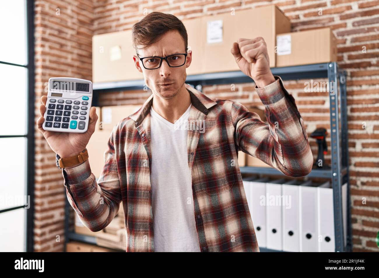 Caucasian business man working at small business ecommerce holding ...