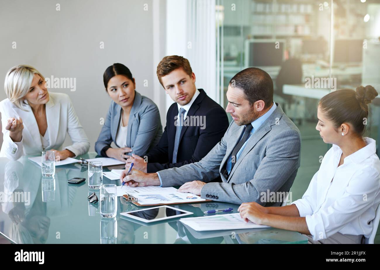 Corporate group in business meeting, team discussion in conference room ...