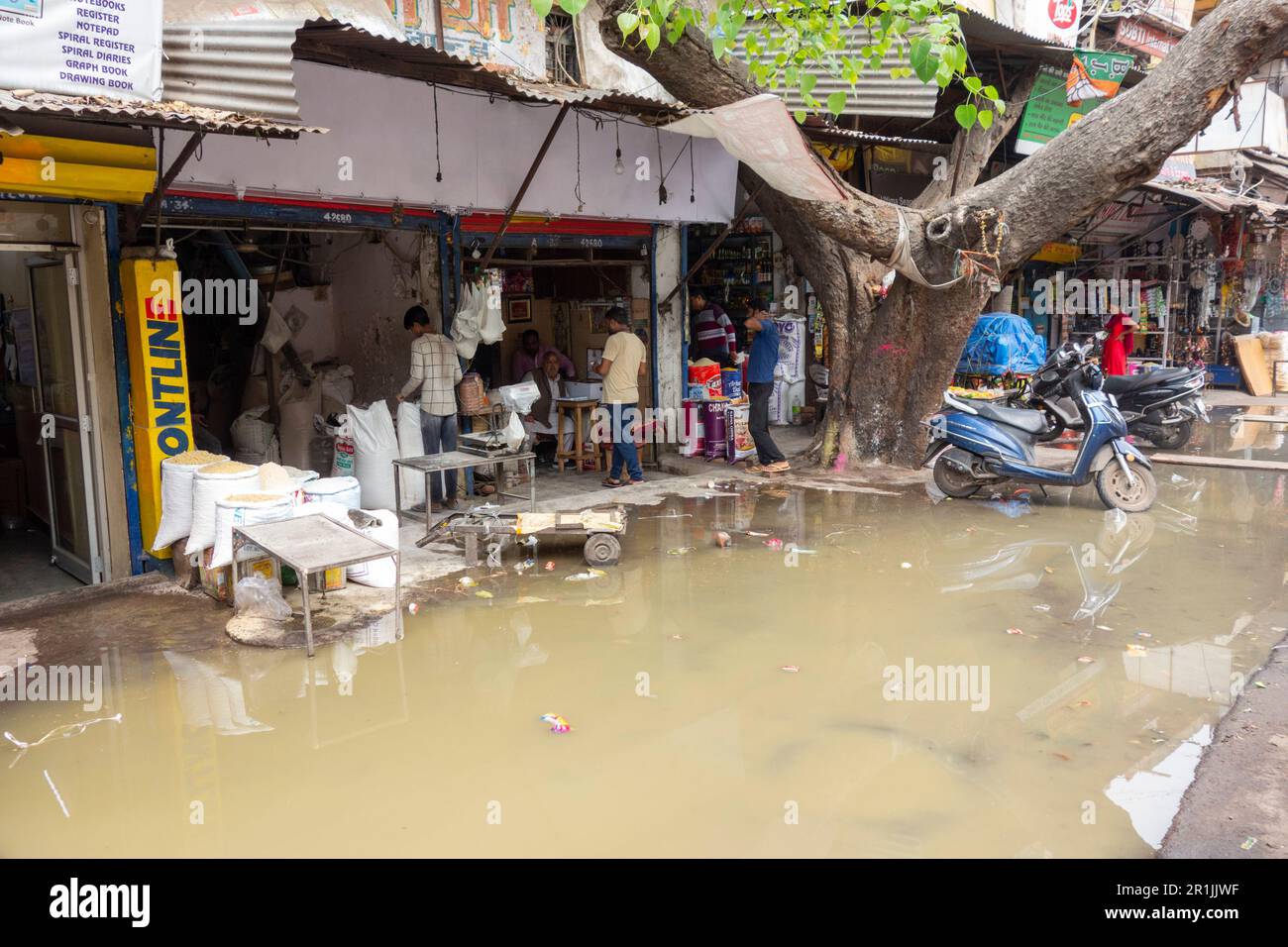 Indian man in drainage water hi-res stock photography and images - Alamy
