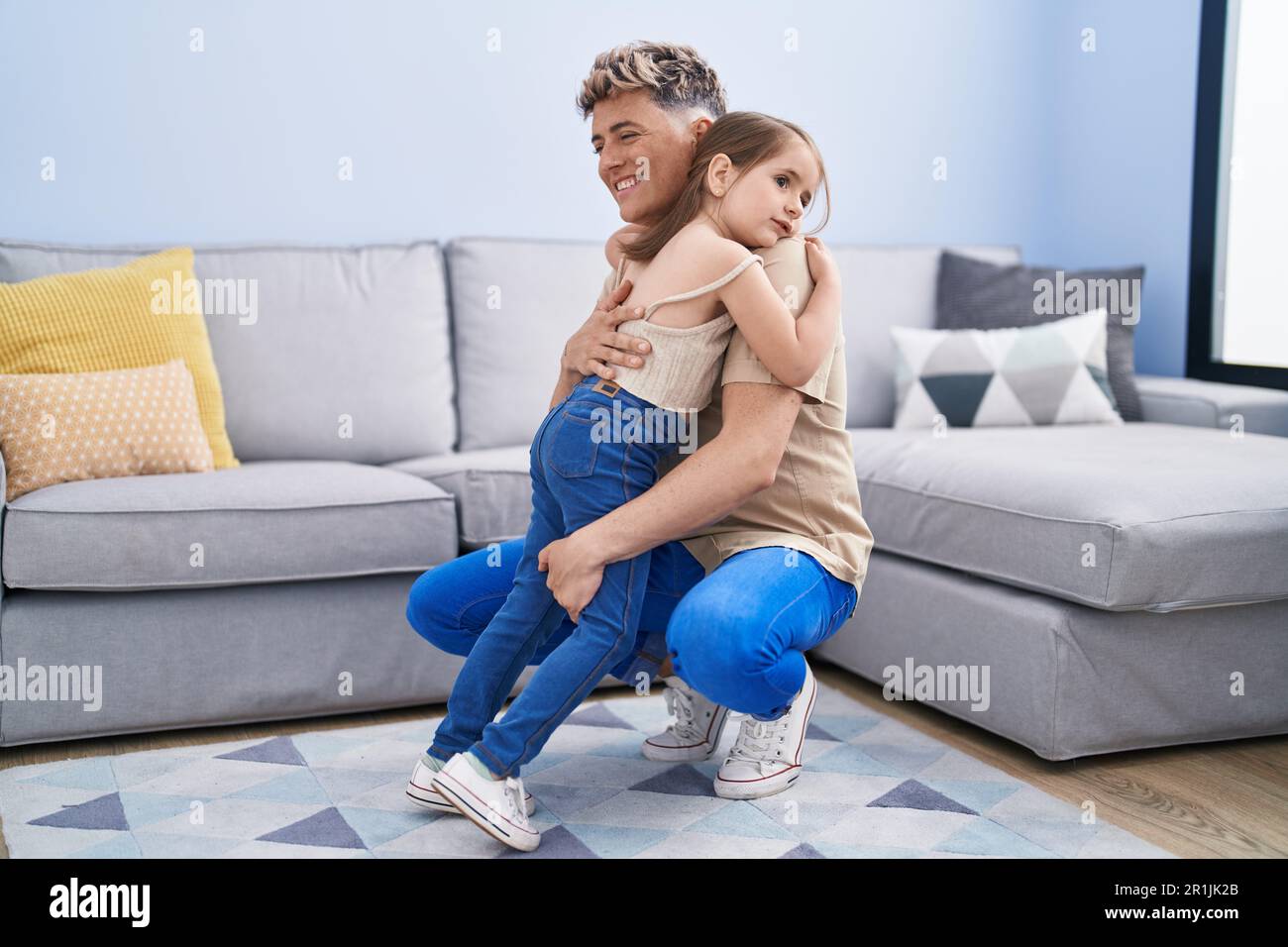 Father and daughter father and daughter hugging each other at home Stock Photo - Alamy