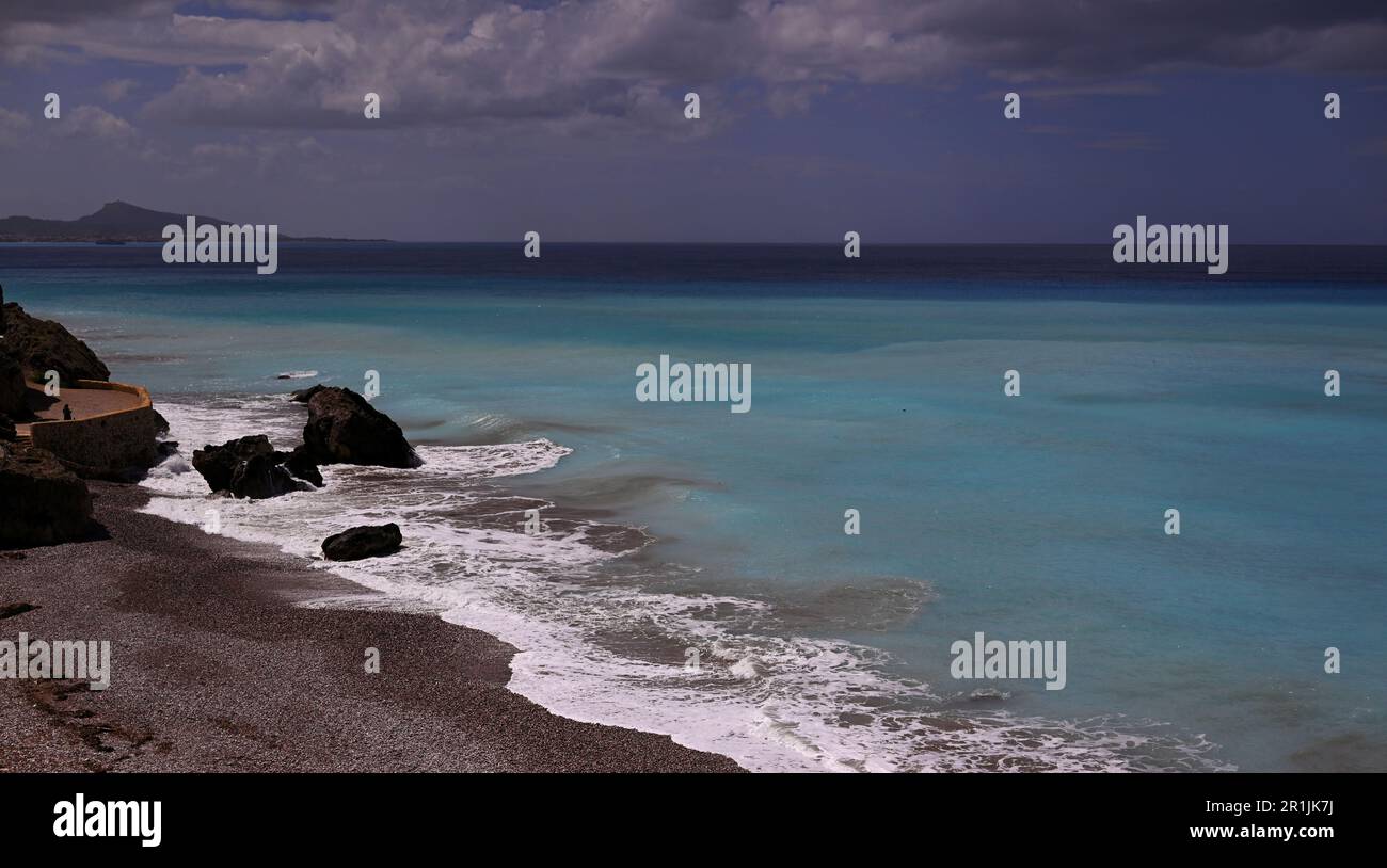 Sea coast of the Mediterranean. Shoreline with pebble beach and white ...
