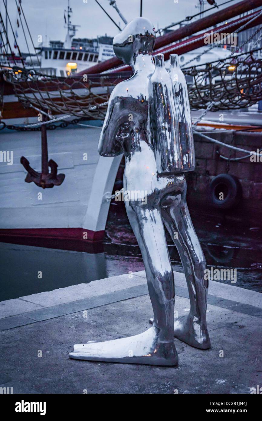 The Dykkaren Silver statue of a diver in ferry terminal in Oslo, Norway ...