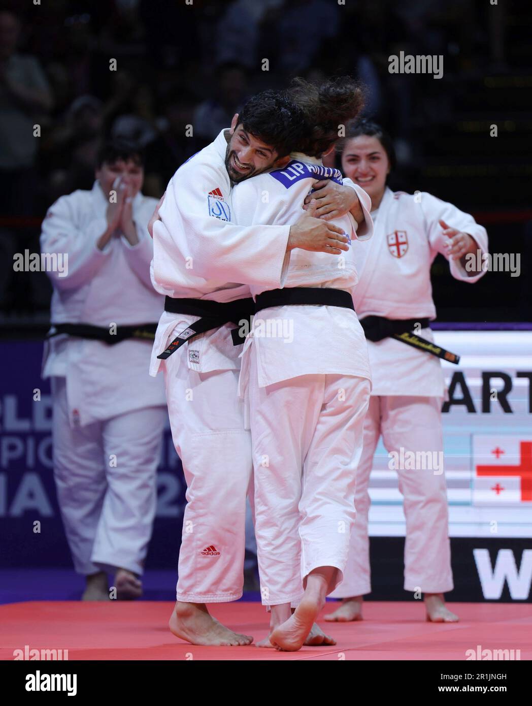 Members of Georgia celebrate during World Judo Championships 2023 mixed ...