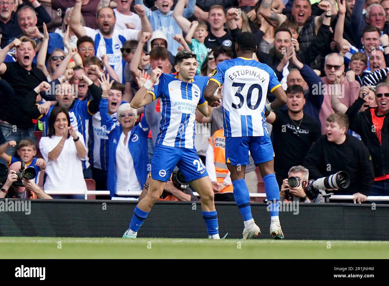 Brighton and Hove Albion’s Julio Enciso (left) celebrates after scoring ...