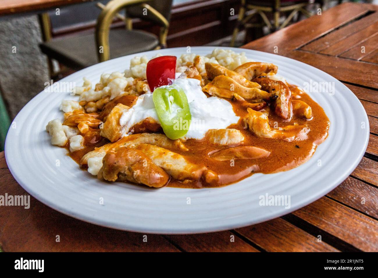 Authentic Hungarian dish - Perkelt with Galuska dumplings Stock Photo ...