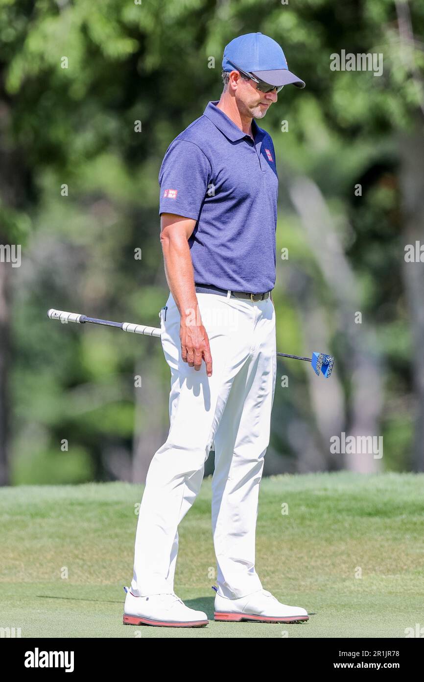 May 13, 2023: Adam Scott sizes up his putt on the 2nd hole during the ...