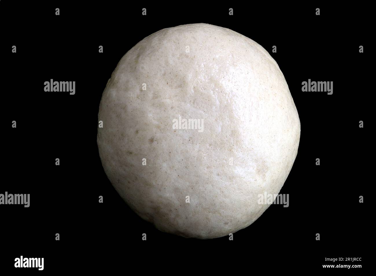 Chinese steamed pau bun on a black background closeup view Stock Photo ...