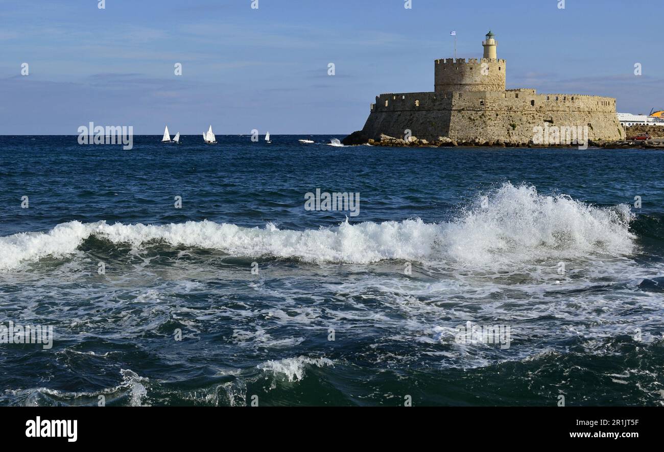 Medieval lighthouse made of stone in the ancient port of the island of ...