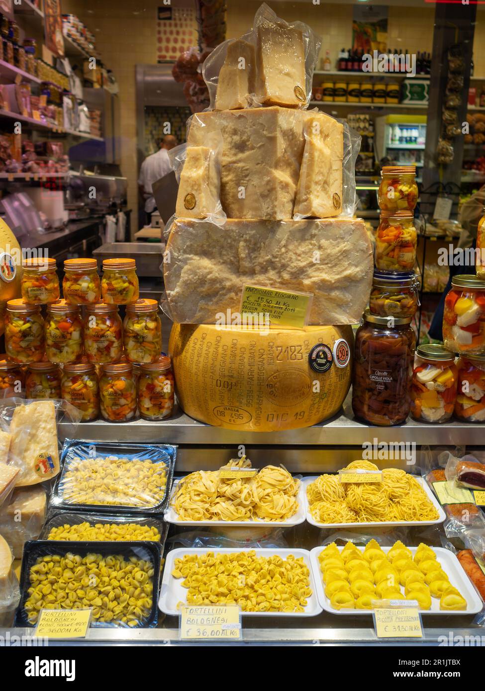 Grossery shop window display with Italian pasta and cheese Stock Photo ...