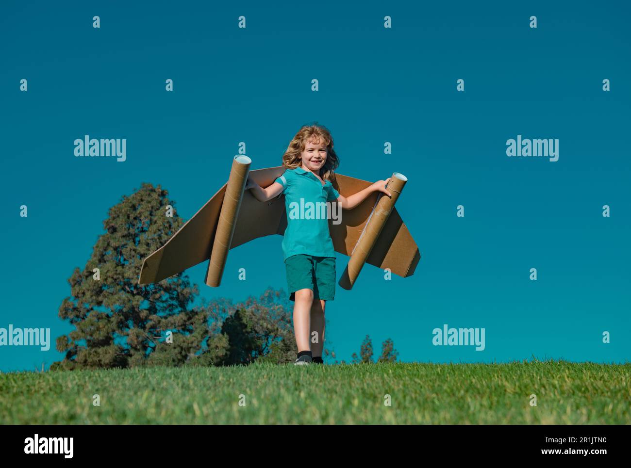 Boy child with wings at sky imagines a pilot and dreams of flying Stock ...