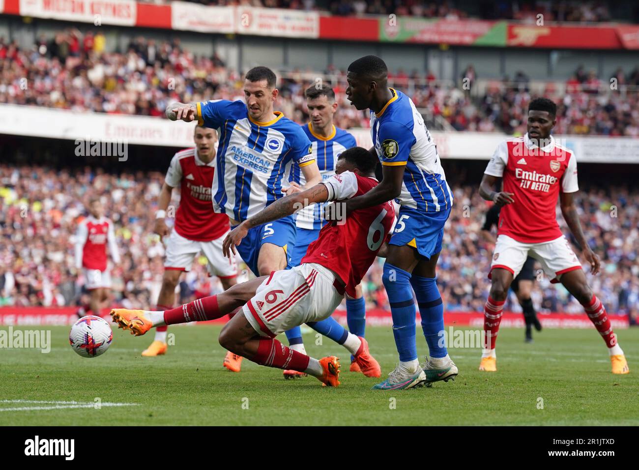 Arsenal’s Gabriel (centre) shoots towards goal during the Premier ...