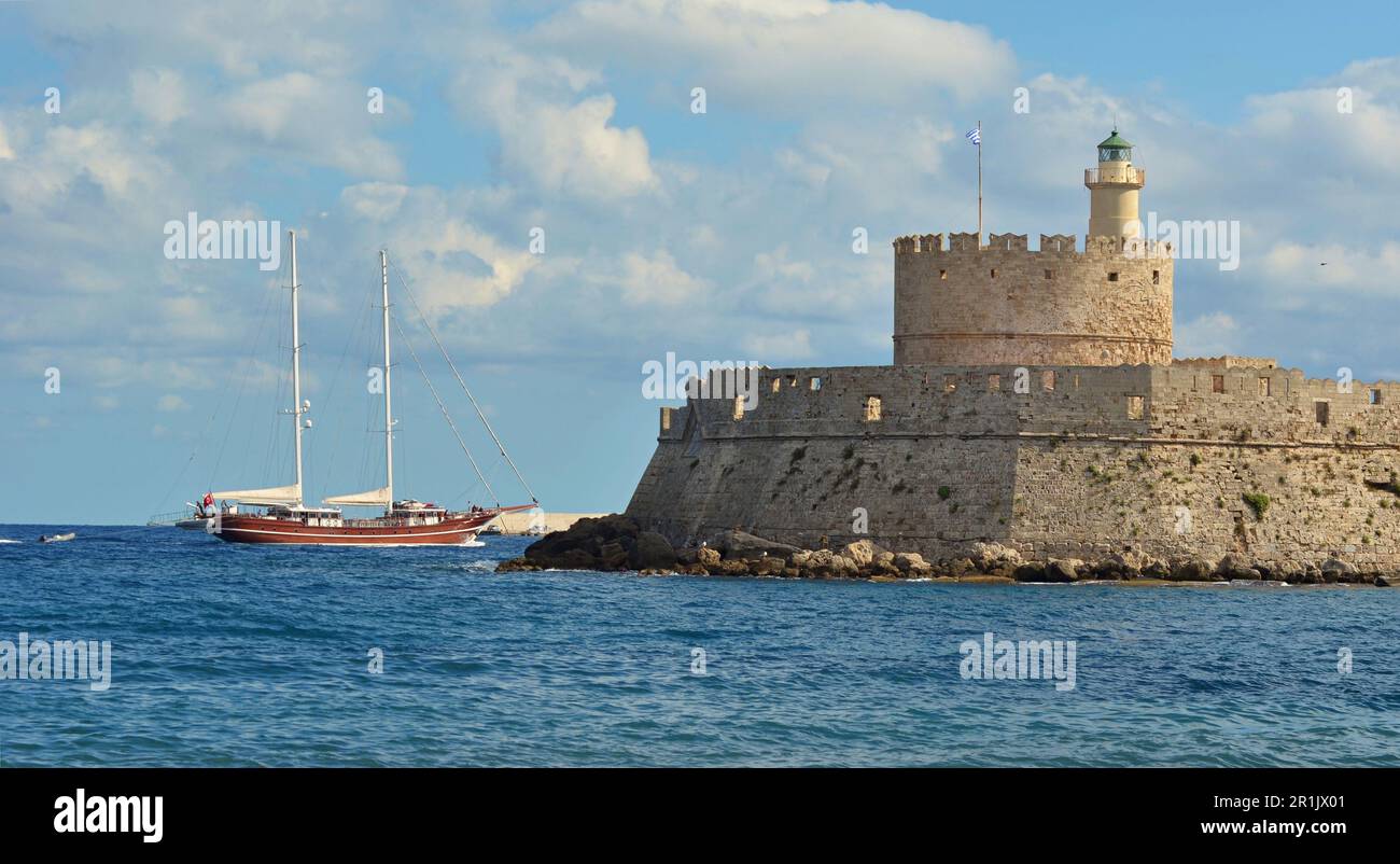 Medieval lighthouse made of stone in the ancient port of the island of ...