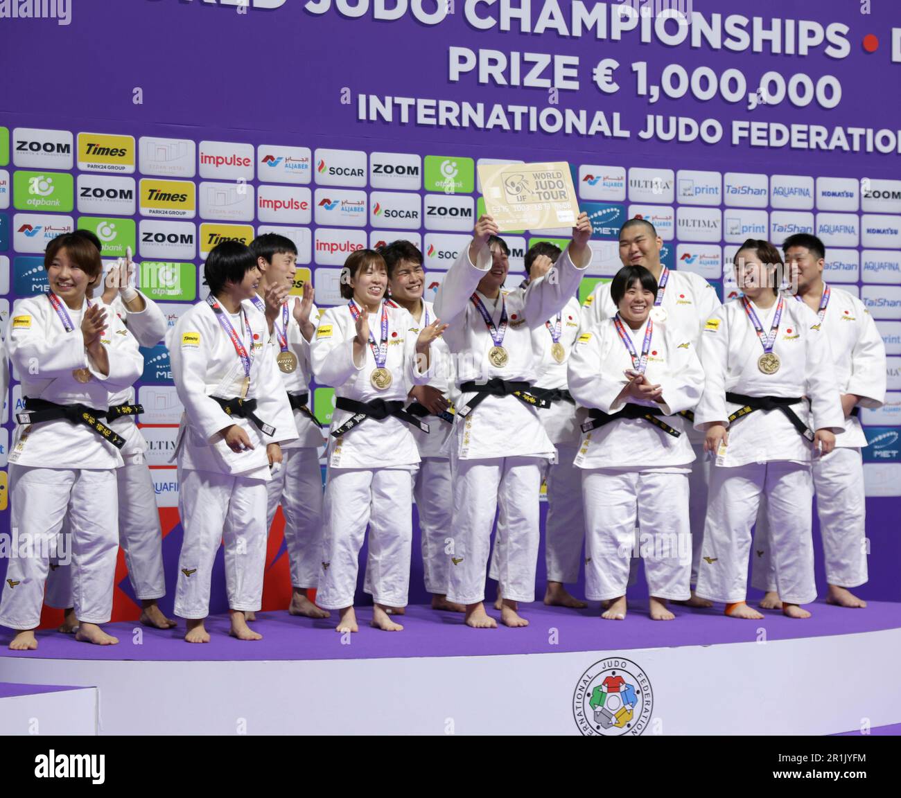Members of Japan celebrate during an award ceremony of World Judo ...