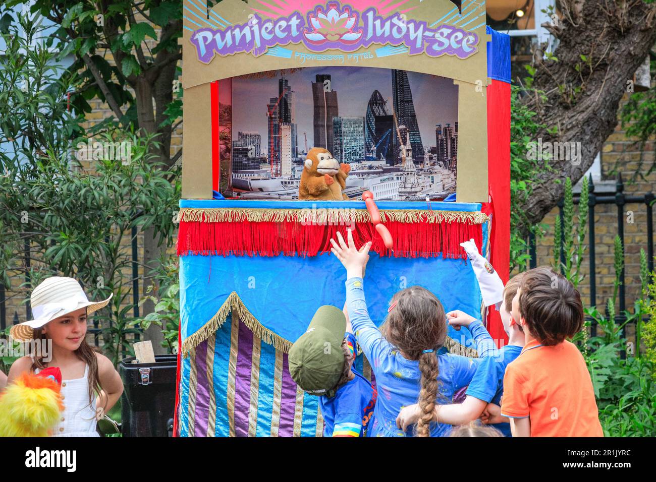 London, UK. 14th May, 2023. Children have fun with the puppets and ...