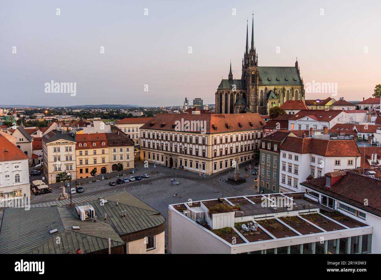 Evening skyline of Brno city with Zelny trh square and the cathedral of ...