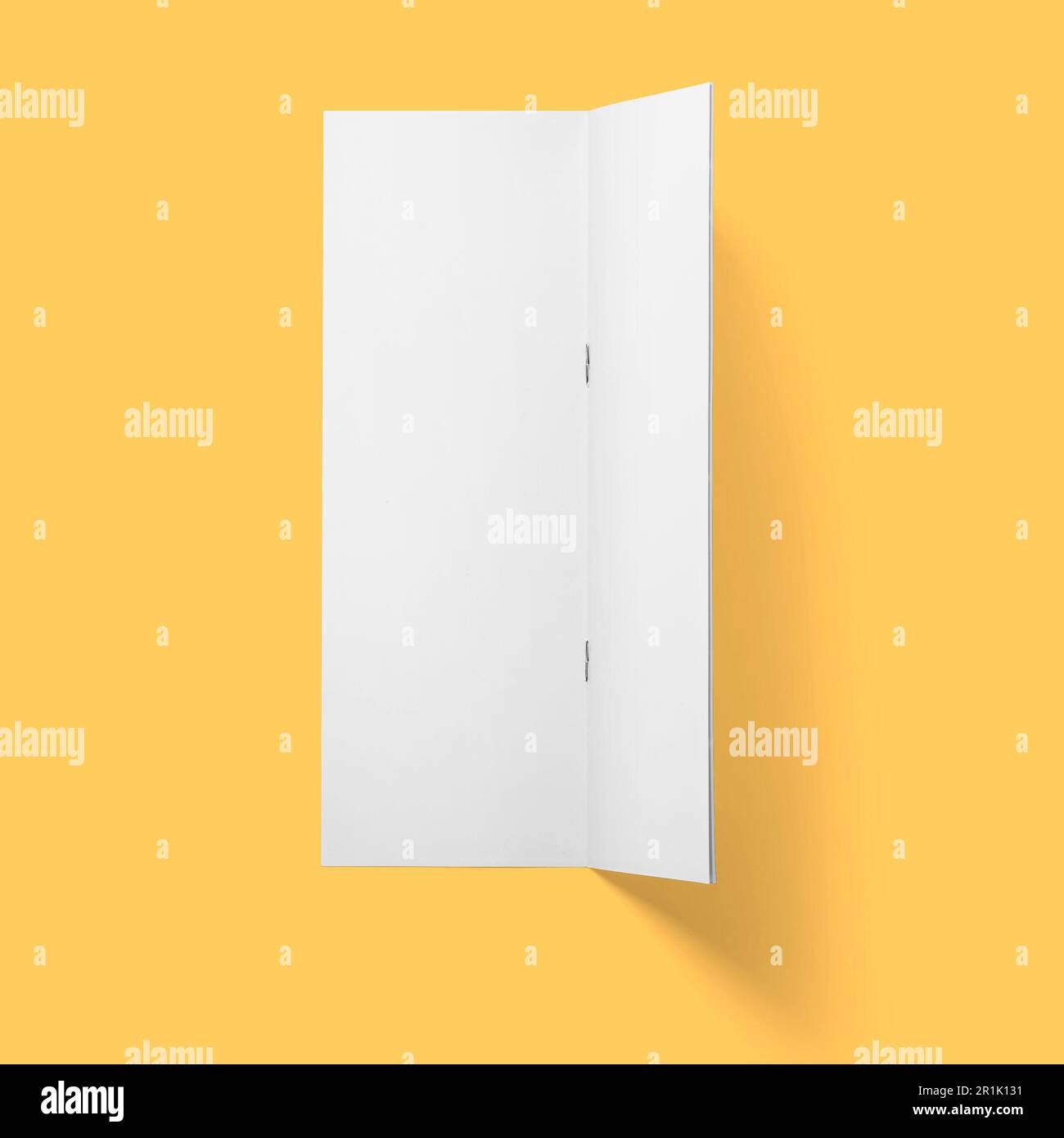 Top up view blank white brochure vertical upside down open isolated on ...