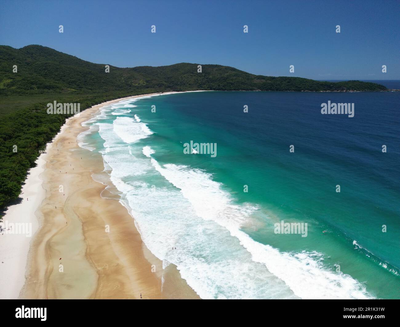 An aerial view of the stunning Lopes Mendes beach, with golden sand and ...