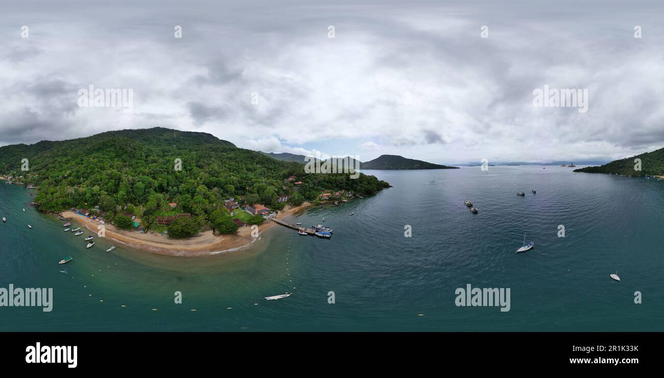 The Big Island in Angra dos Reis surrounded by a tranquil blue ocean ...